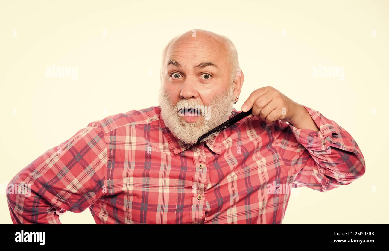 Male haircut. Comb hair. Hairstylist use professional equipment ...