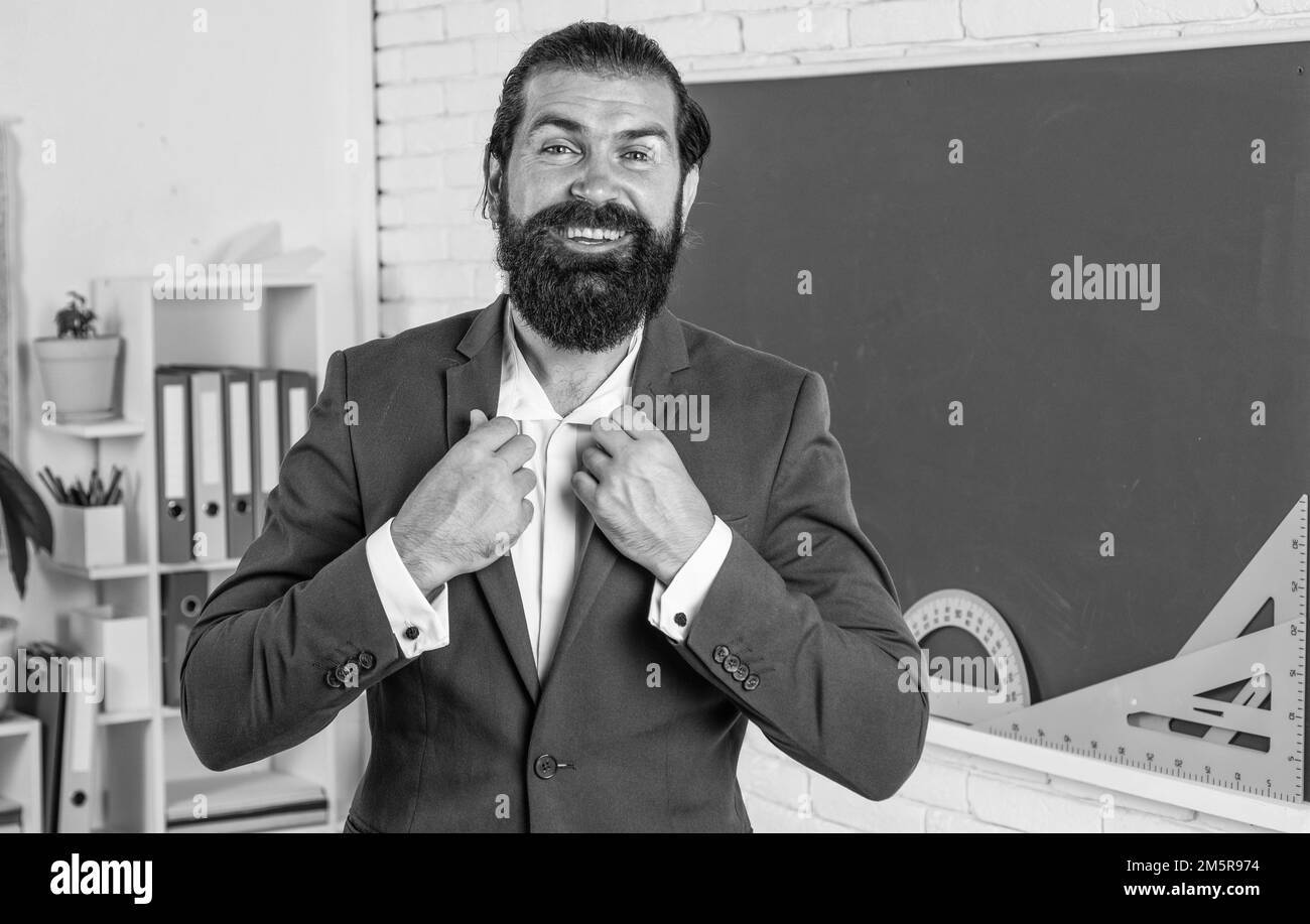 man with beard and moustache look as businessman or teacher in college ...