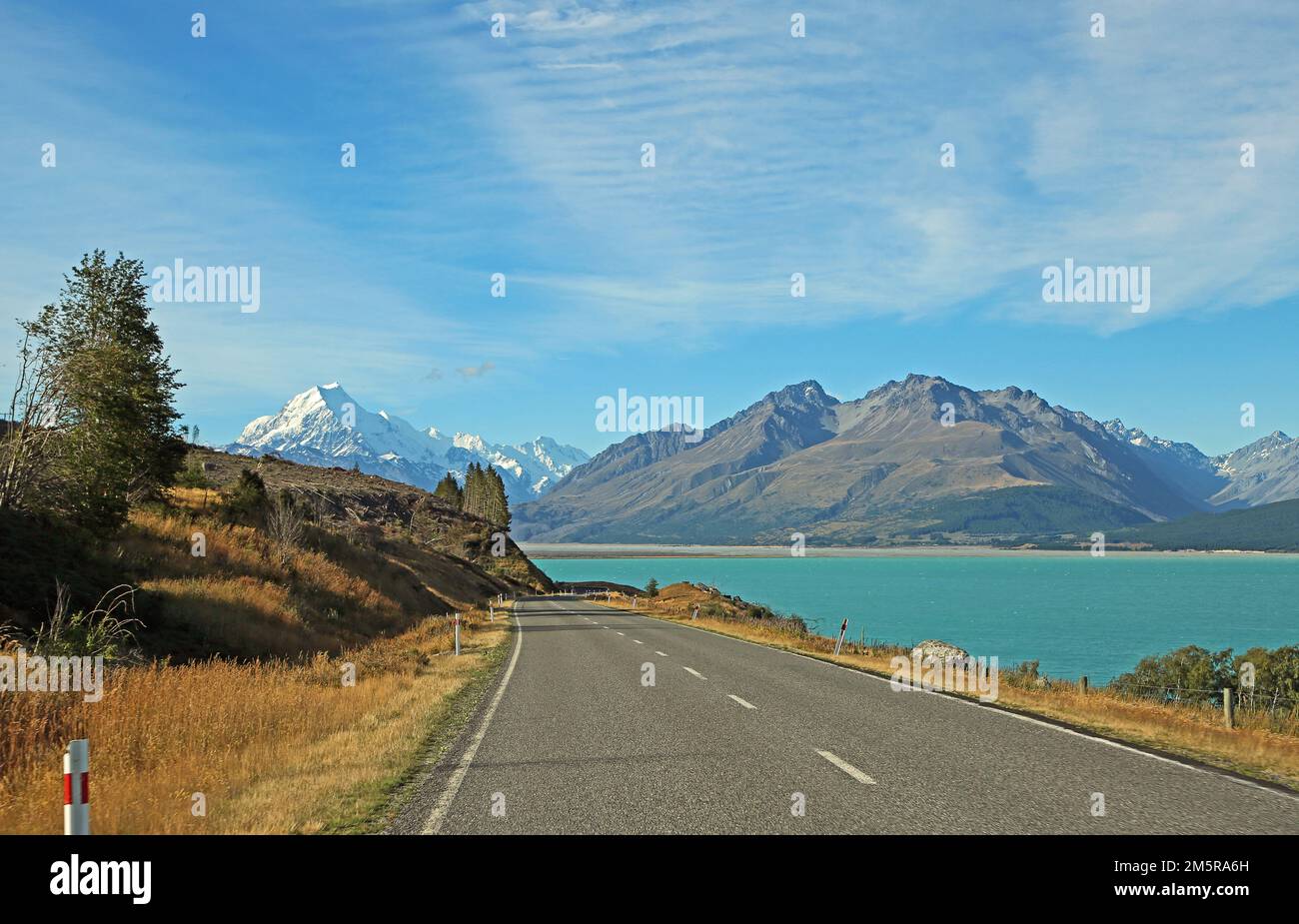 Road on Pukaki Lake - Mt Cook, Aoraki - New Zealand Stock Photo - Alamy
