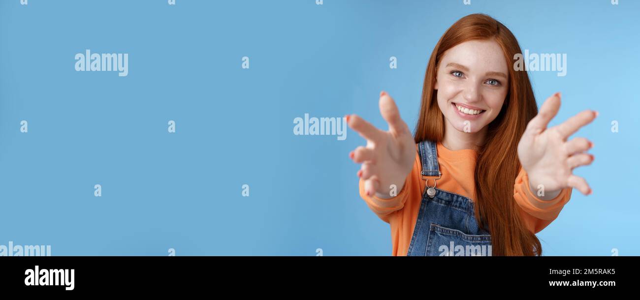 Come into arms. Charming sincere happy kind redhead girl baby sitting ...