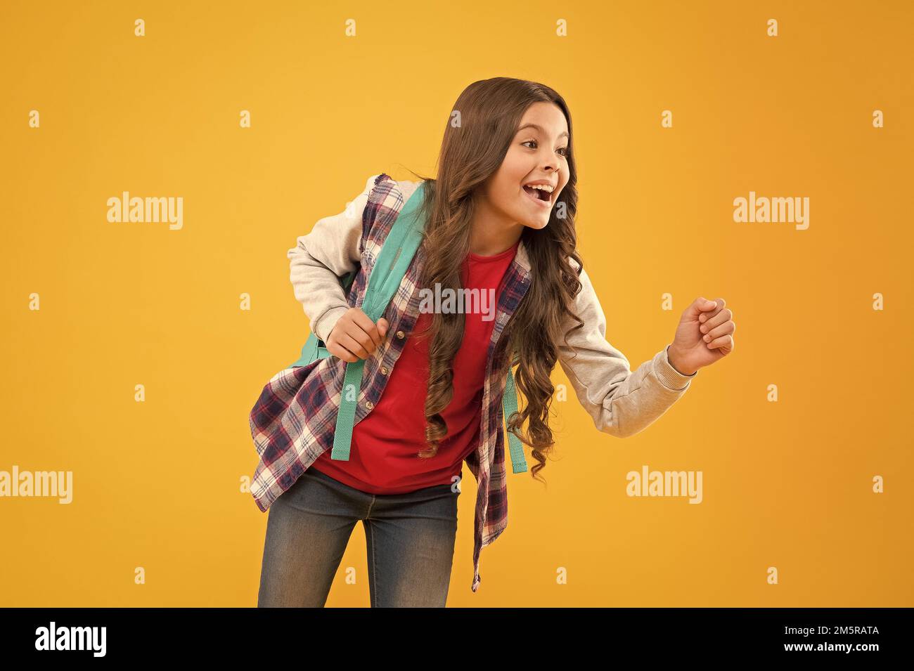 Happy back to school child pretend holding something in hand yellow ...