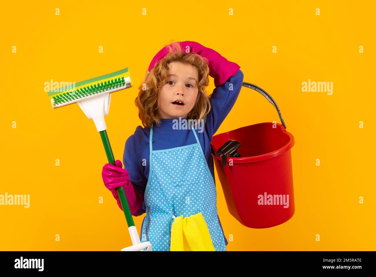 Little kid cleaning at home. Child doing housework having fun. Studio ...