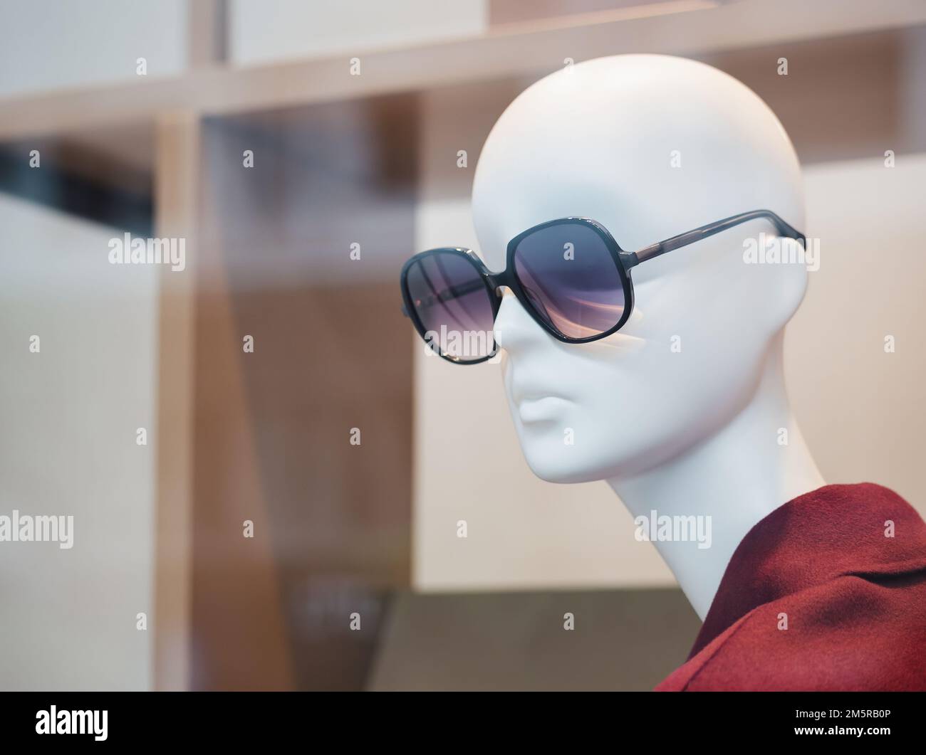 Window mannequin with sun glasses. Clothes fashion concept Stock Photo ...