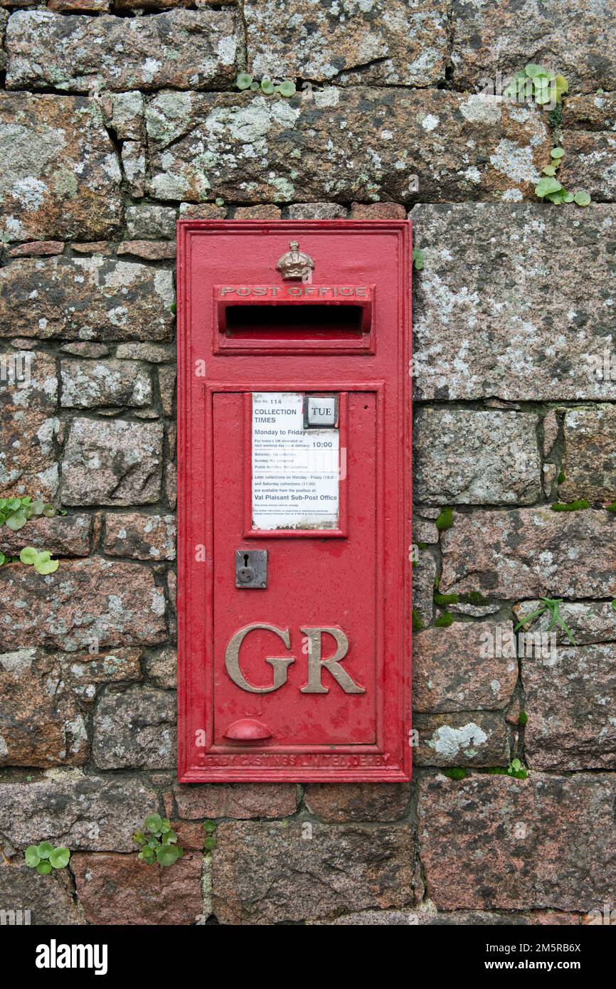 George Rex (IV) Post Box in Granit wall, Jersey, Channel Islands Stock ...