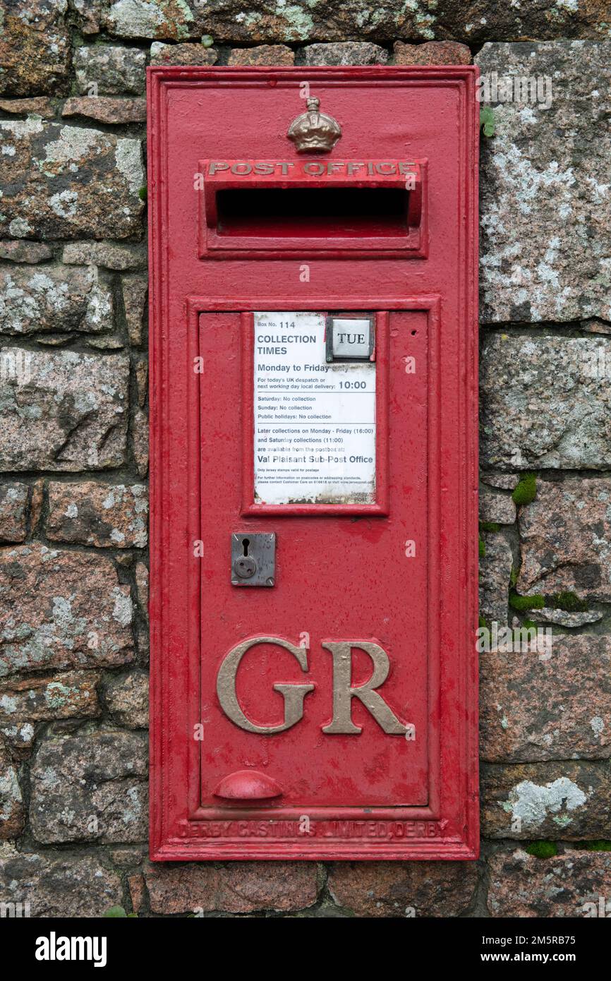 George Rex (IV) Post Box in Granit wall, Jersey, Channel Islands Stock ...