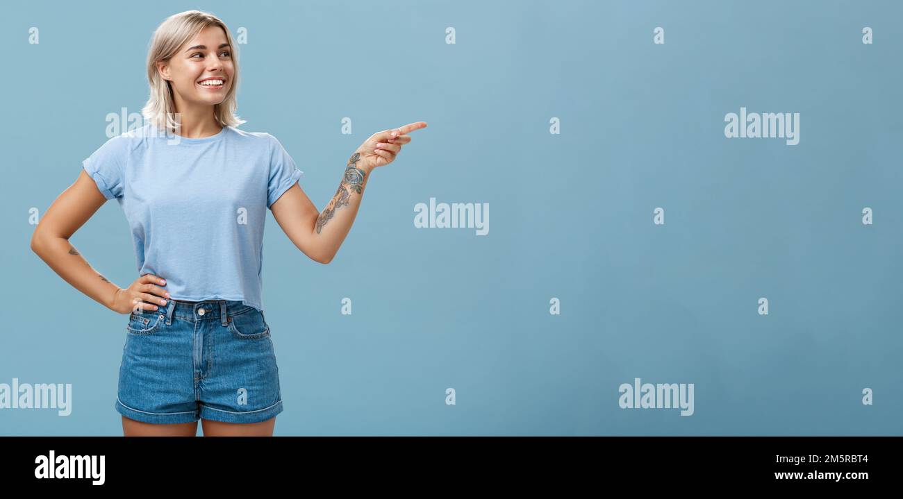 Giving directions arm hi-res stock photography and images - Alamy