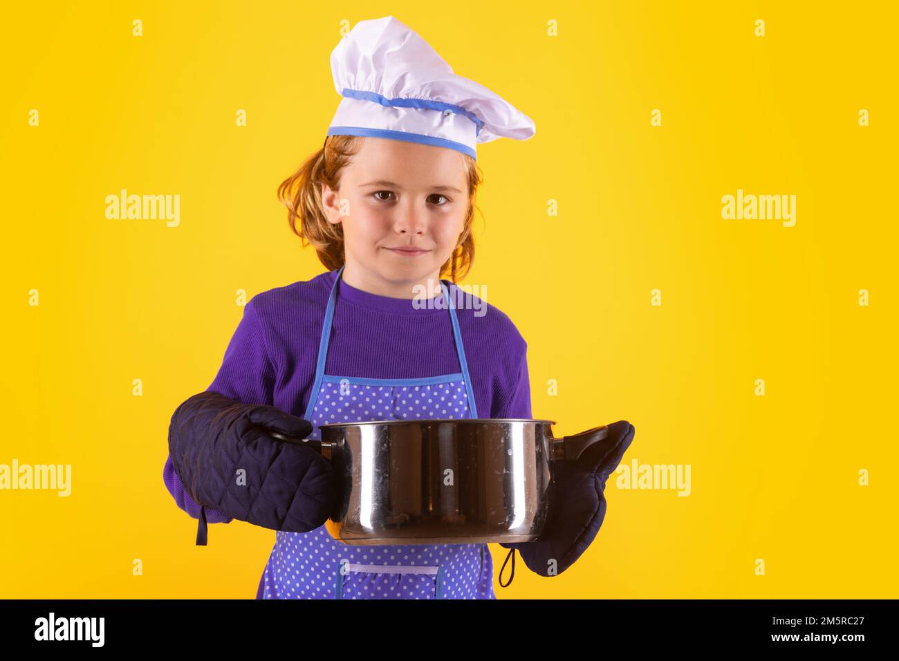 Kid cook with cooking pot. Kid chef cook, studio portrait. Children ...