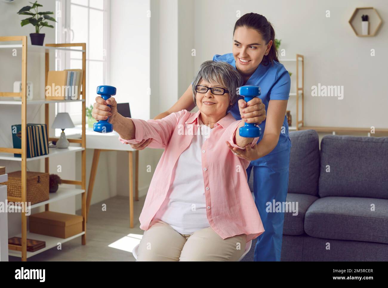Senior woman lifting exercise hi-res stock photography and images - Alamy