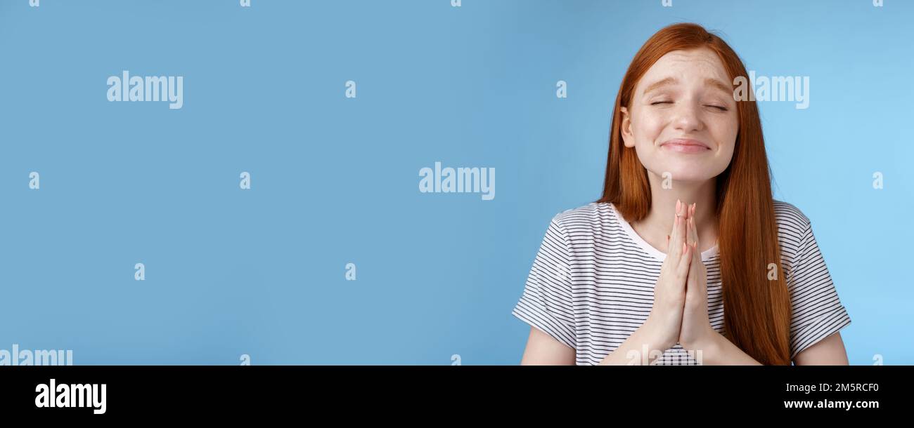 Girl making wish bottom heart willing dream come true press palms ...