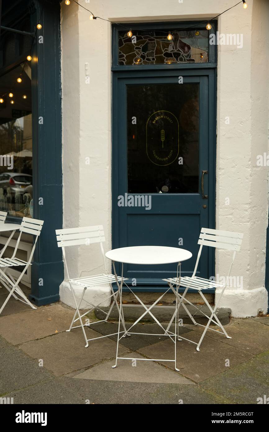 November 2022 - Empty cafe table and chairs on the street during the ...