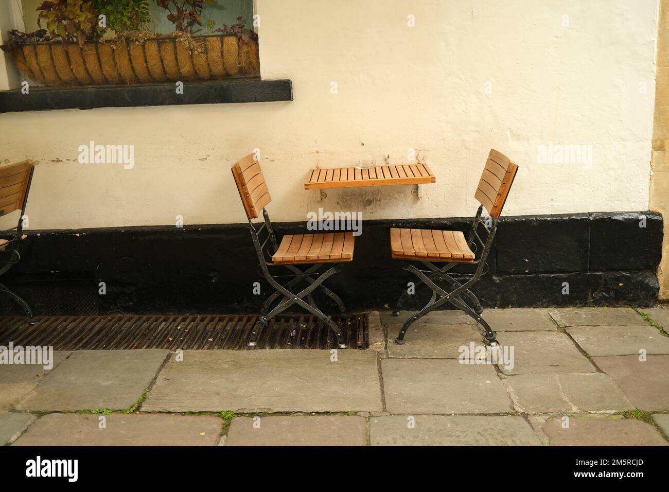 November 2022 - Empty cafe table and chairs on the street during the ...
