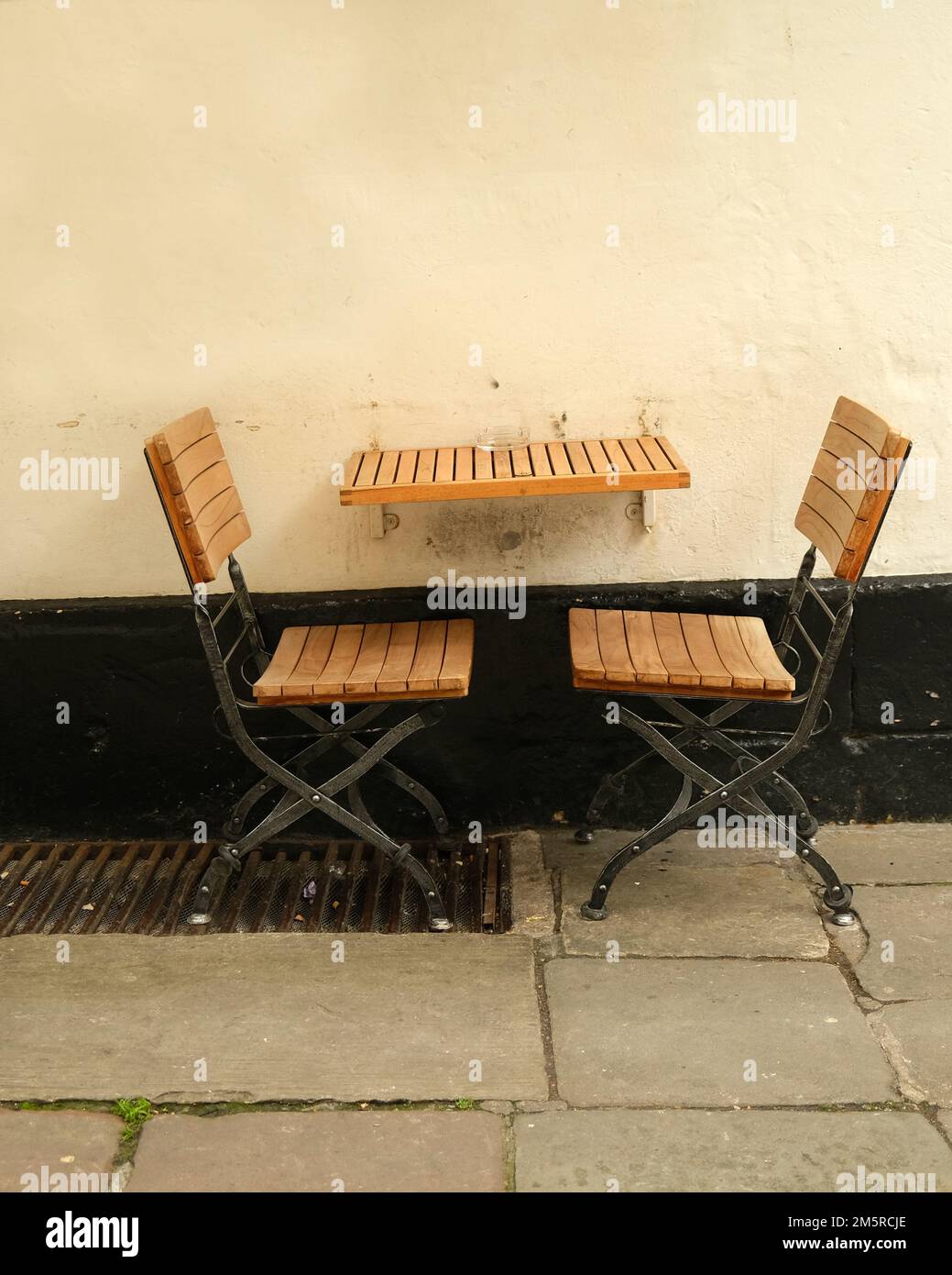 November 2022 - Empty cafe table and chairs on the street during the ...