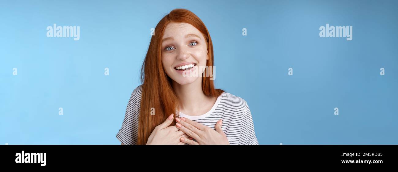 Kind fascinated touched romantic passionate redhead girl blue eyes ...