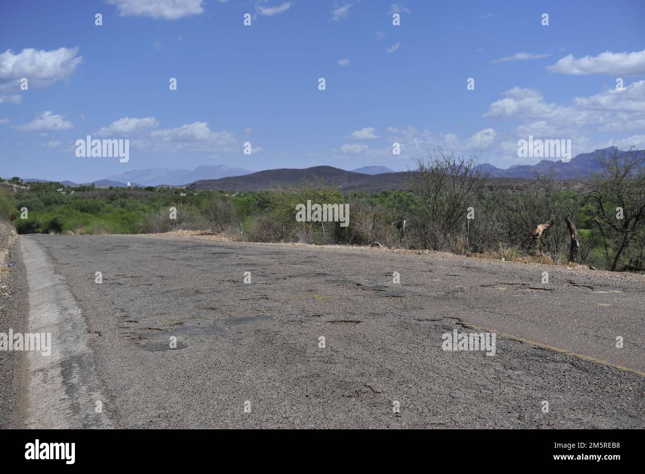 Sonora state highway in poor pavement condition due to potholes (Photo ...