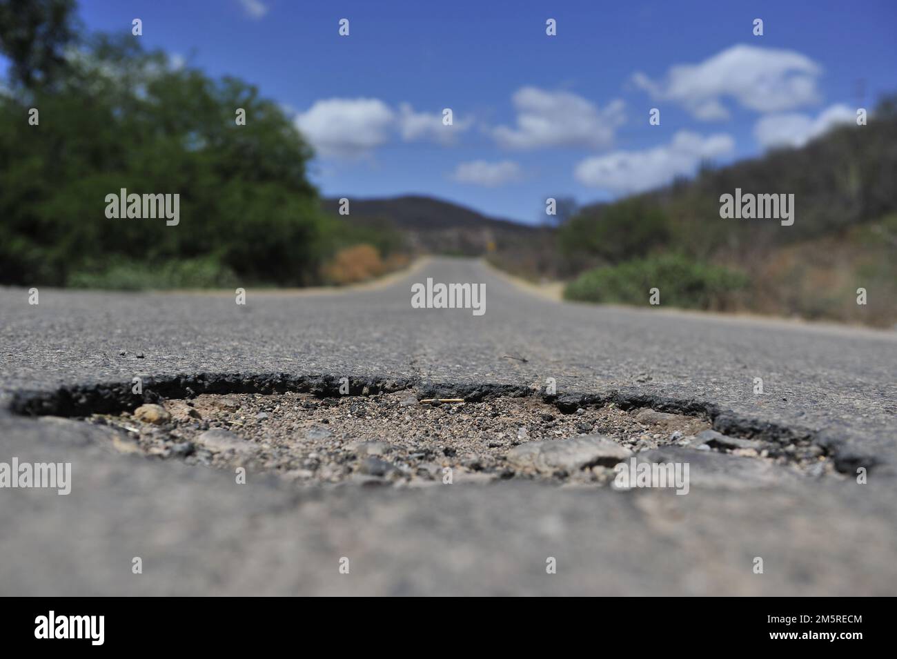 Sonora state highway in poor pavement condition due to potholes (Photo ...