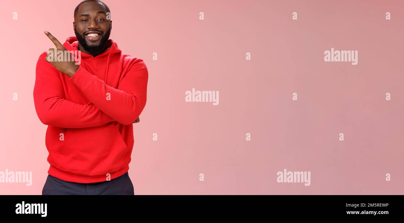 Cheeky outgoing smiling attractive african-american male model in red ...