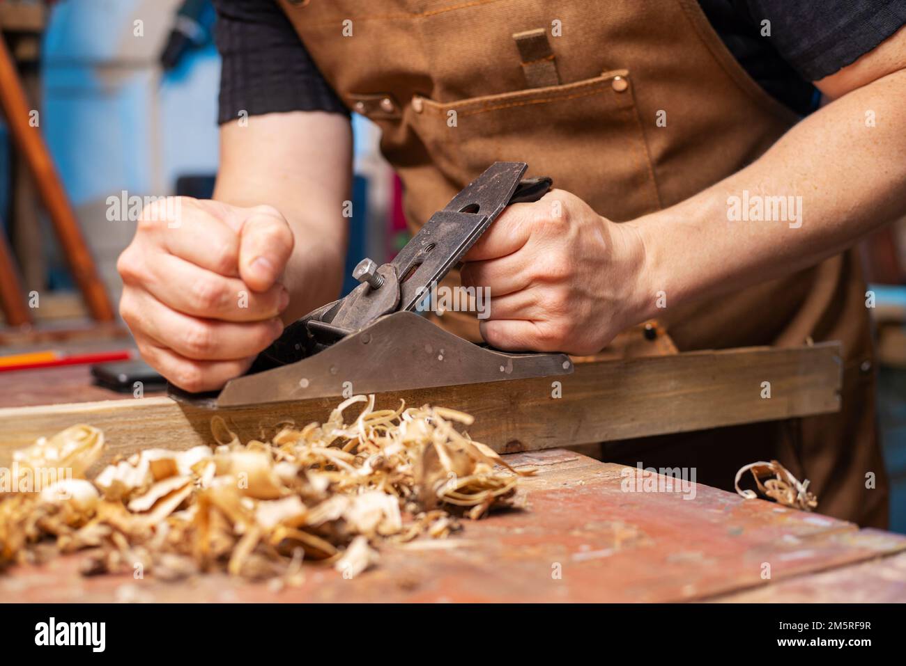 Professional carpenter planing wood planer hi-res stock photography and ...