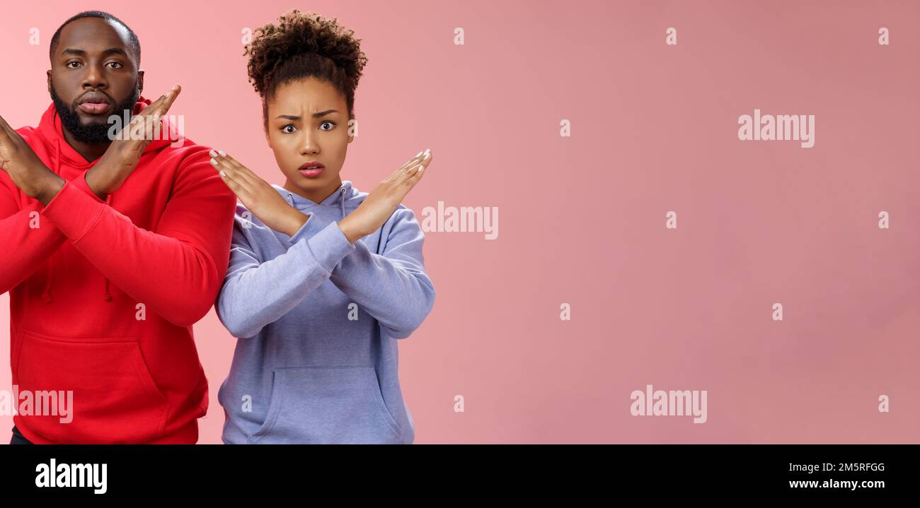 Nervous displeased two african-american man woman asking friend tell ...