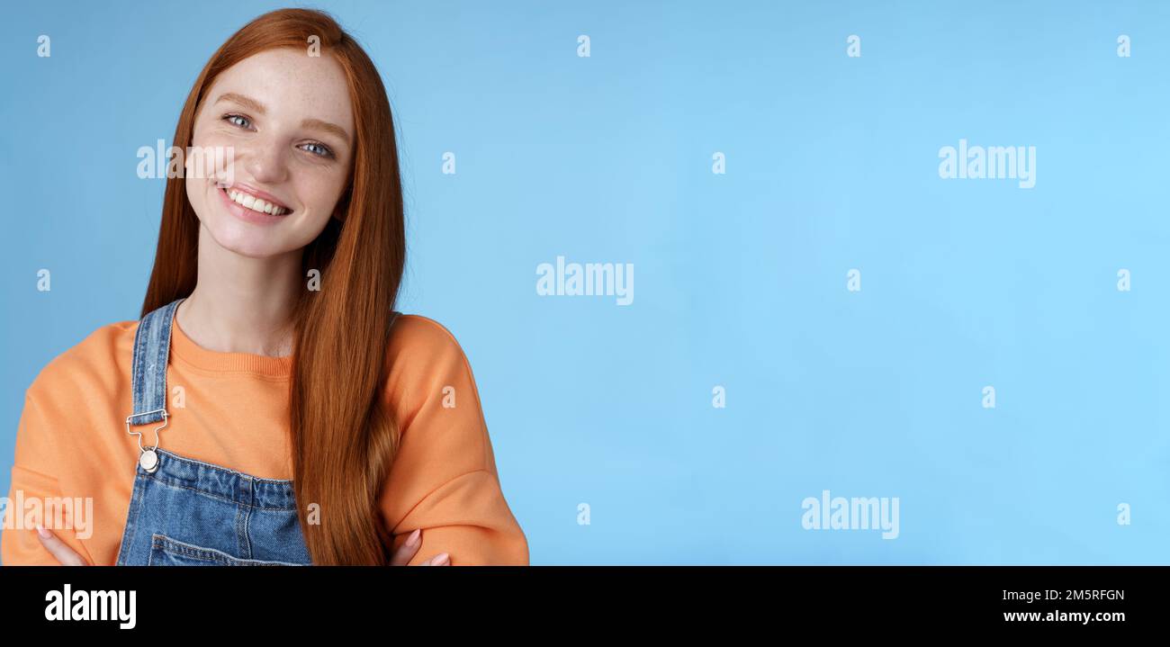Charismatic kind pleasant redhead girl blue eyes smiling friendly ...