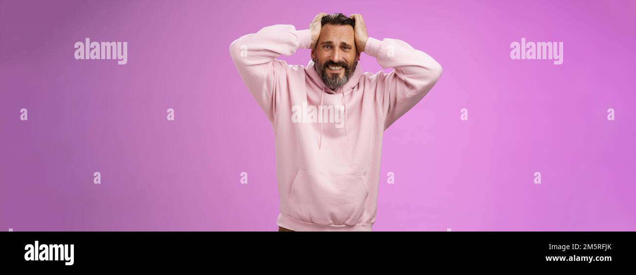 Adult worried insecure bearded man panicking despair touch head ...
