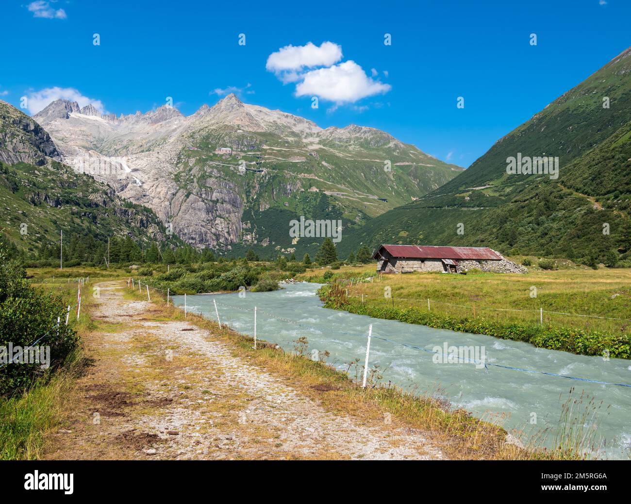 River Rhone and a view at the Rhone glacier from village Gletsch in ...