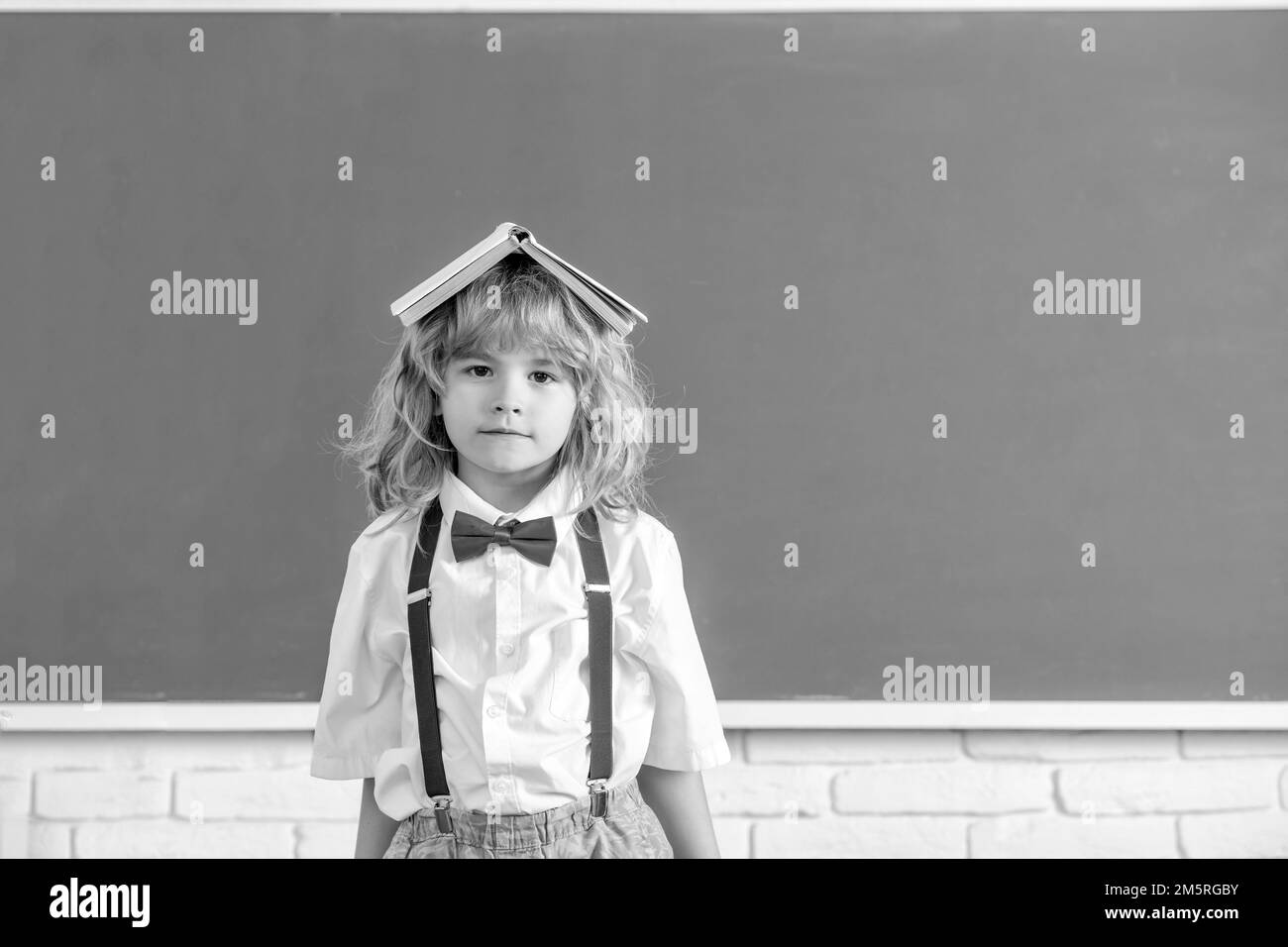 back to school. knowledge day. concept of education. nerd kid with long ...