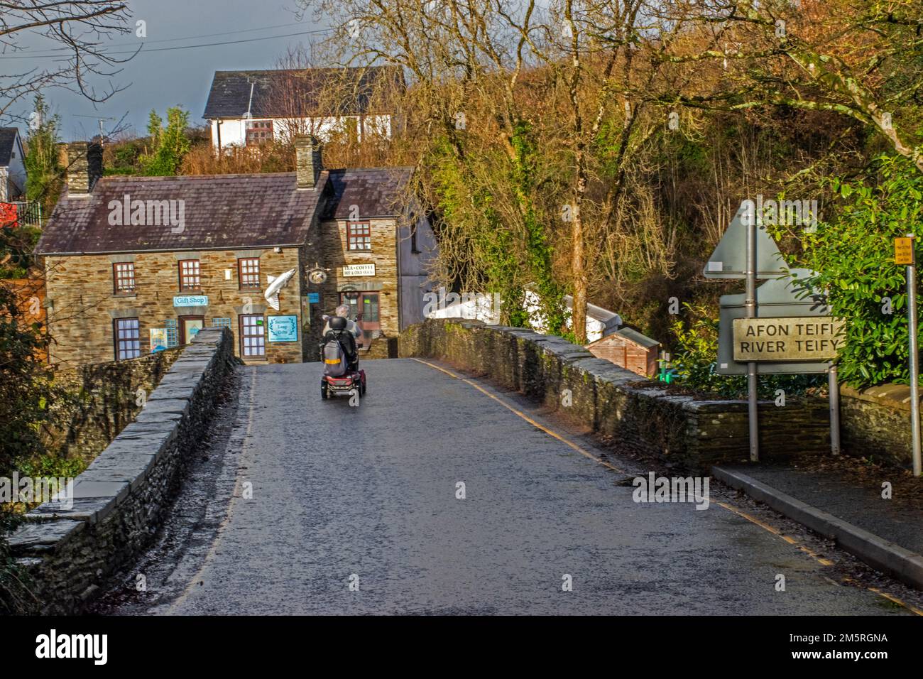 A disabled trolley crossing Cenarth Bridge Stock Photo - Alamy