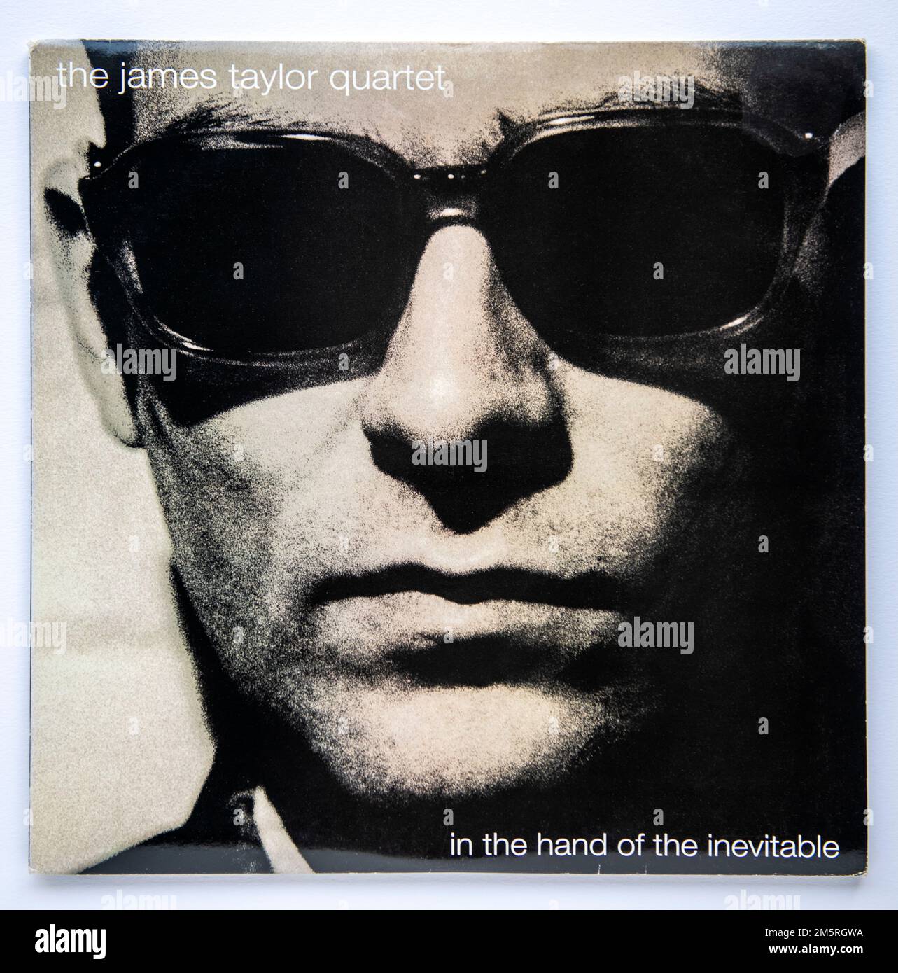 LP cover of the In the Hand of the Inevitable album by The James Taylor ...