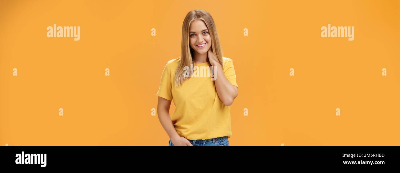Portrait of shy and timid feminine girl with tan and straight fait hair ...