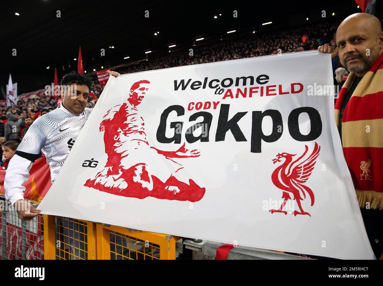 Liverpool fans in the stands hold up a banner welcoming new signing ...