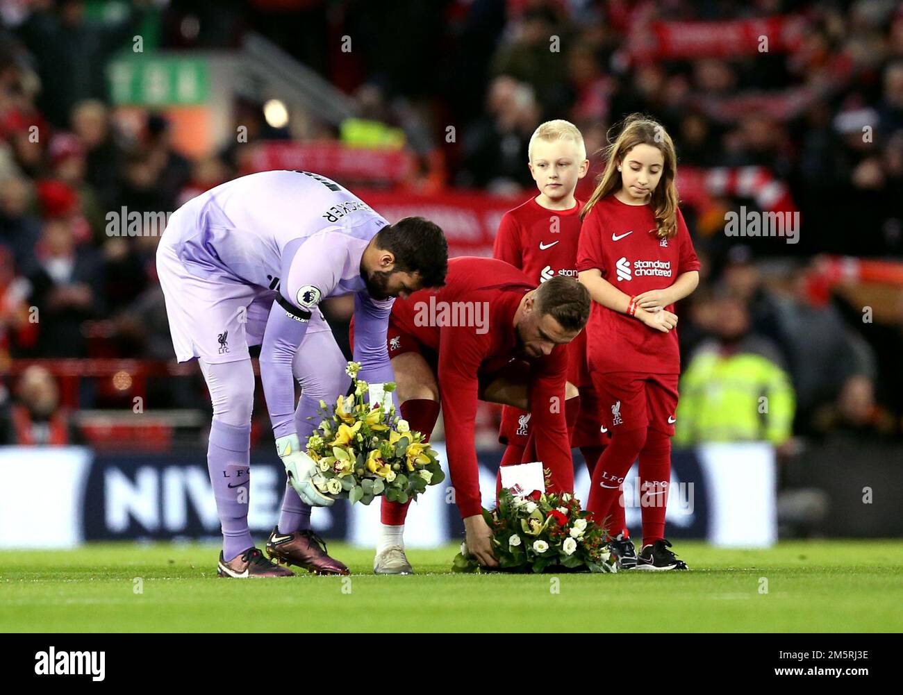 Liverpool goalkeeper Alisson Becker lays a wreath for late compatriot ...