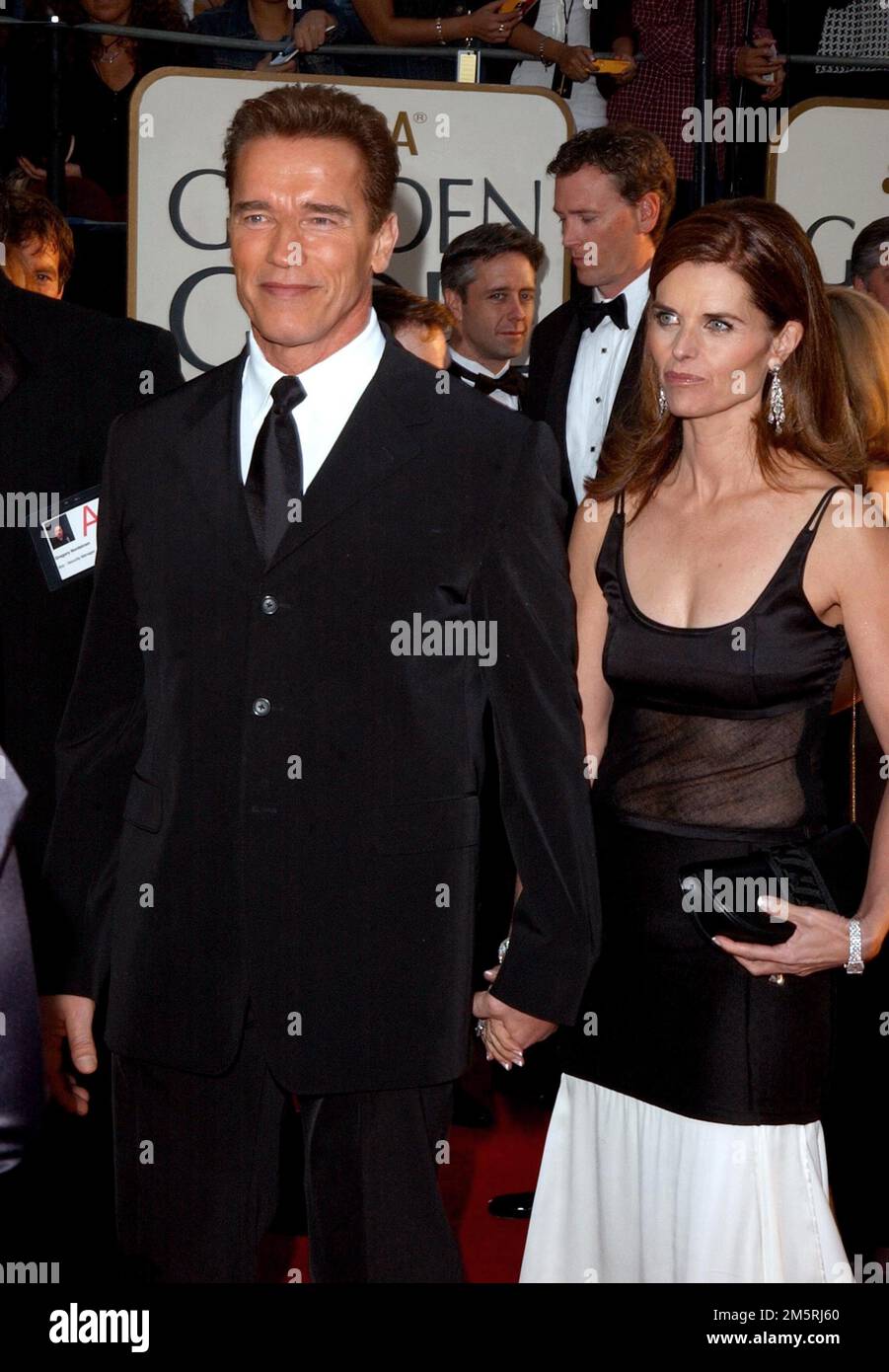 Arnold Swarzenegger & Maria Shriver attending the Golden Globes in 2002 ...