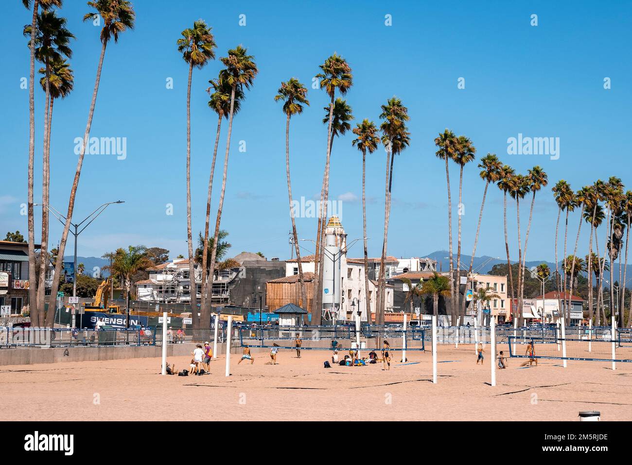 People playing volleyball at Santa Cruz beach during sunny day Stock ...