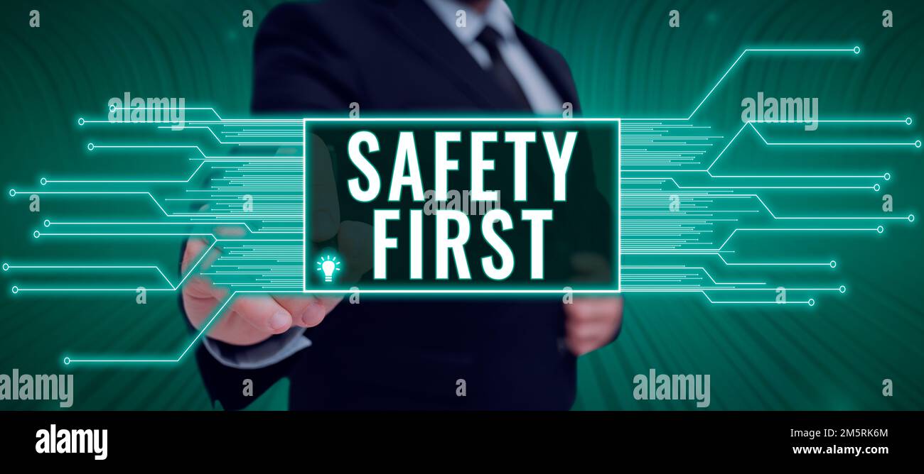 Hand writing sign Safety First. Conceptual photo Avoid any unnecessary ...