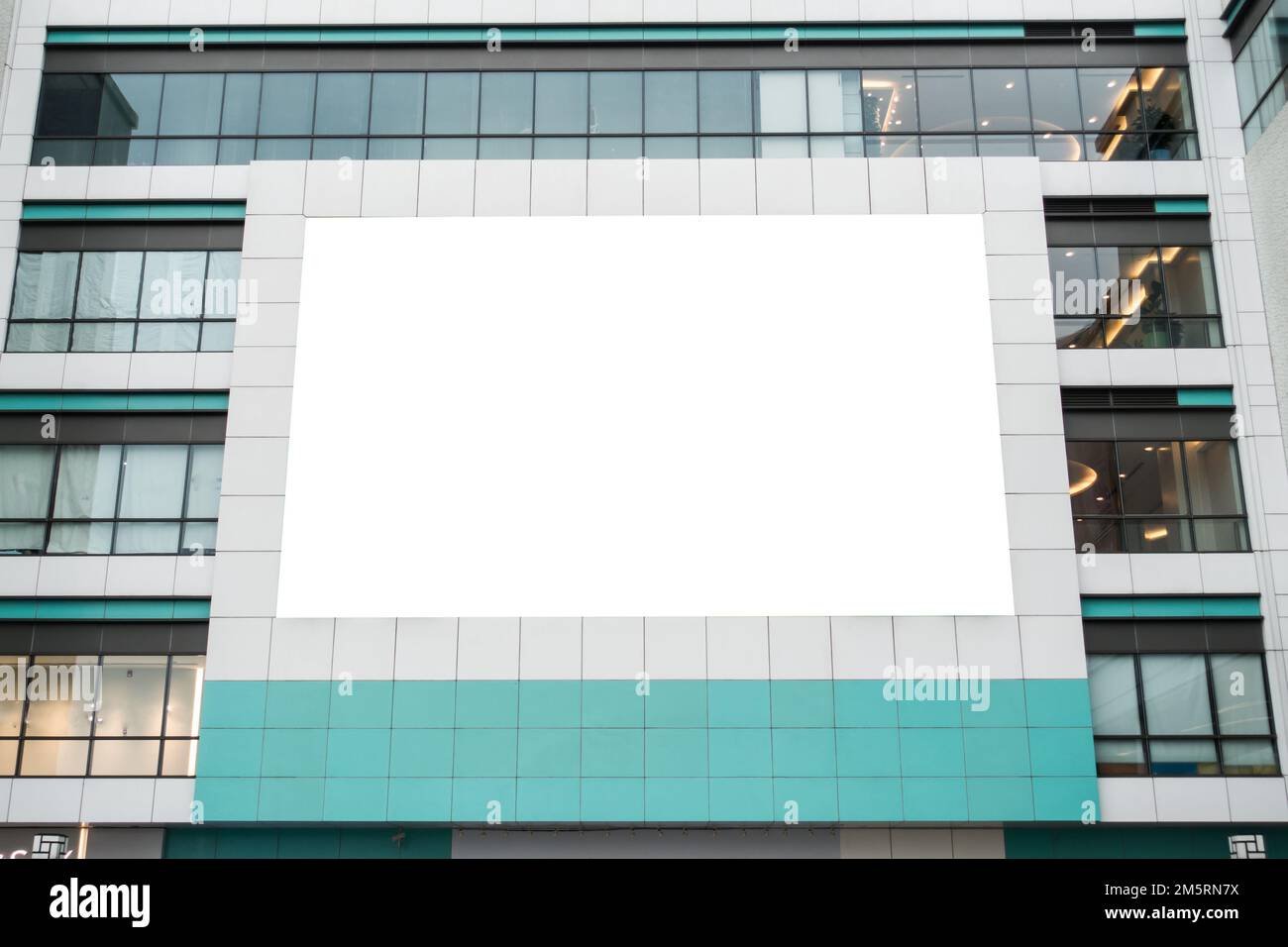 A clean white screen on the wall of a building Stock Photo - Alamy