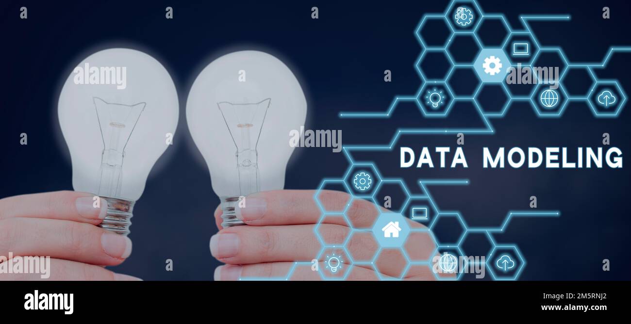 Text caption presenting Data Modeling. Conceptual photo process of transferring data between ...