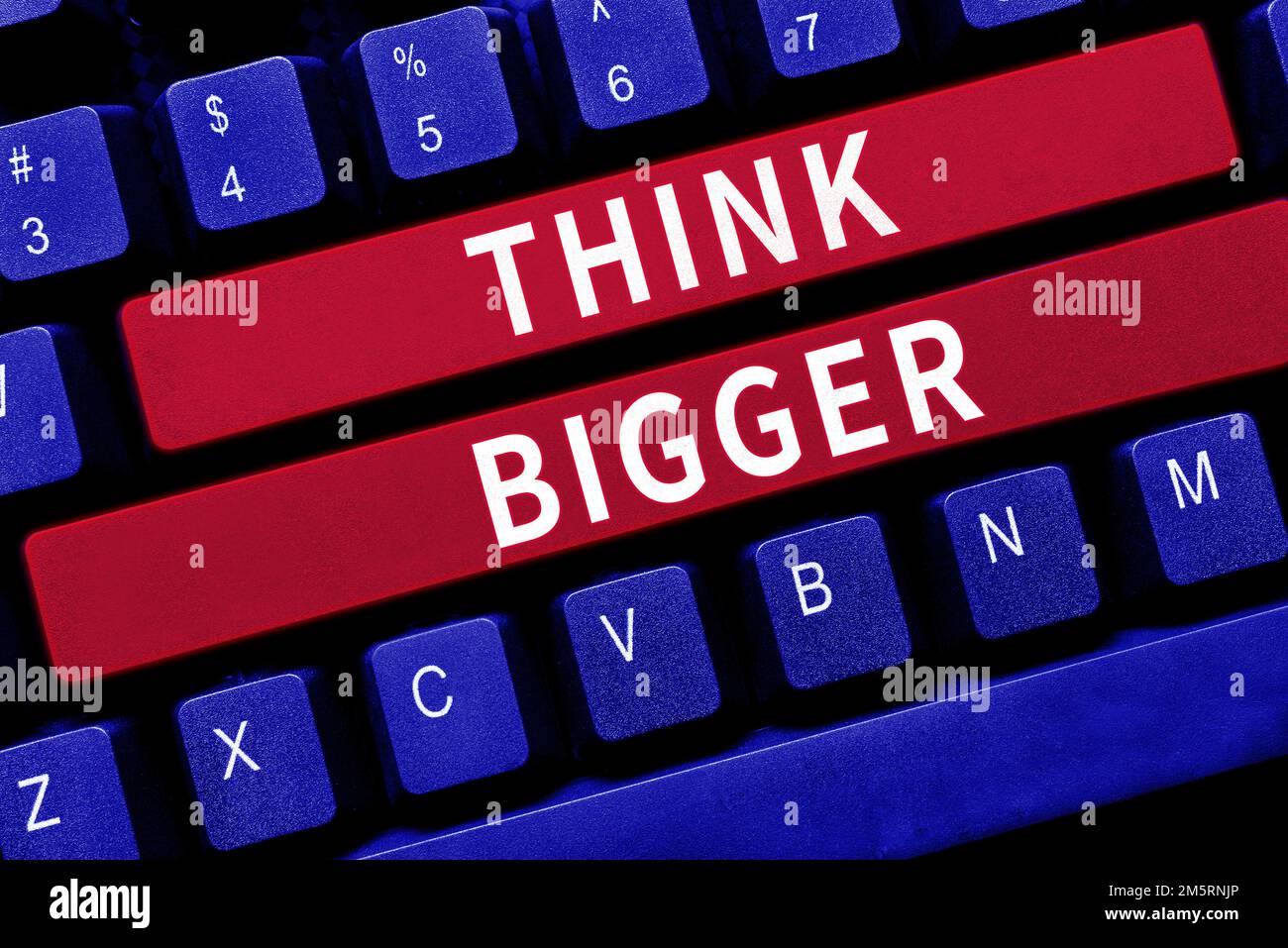 Sign displaying Think Bigger. Business overview being able to dream and ...