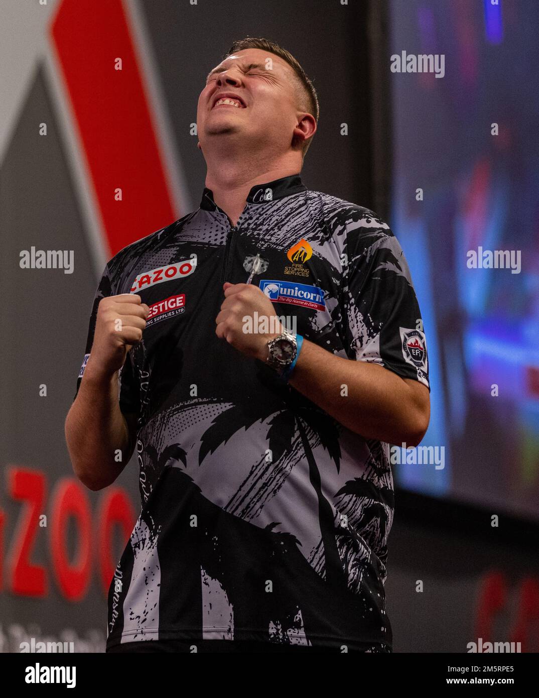 Chris Dobey celebrates winning against Rob Cross during day thirteen of ...