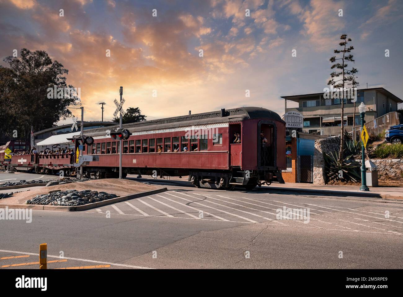 Vintage red train moving on street at Santa Cruz Beach Boardwalk Stock ...