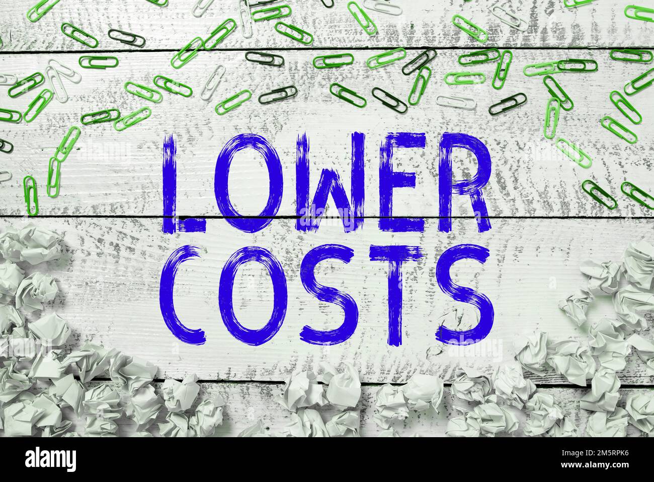 Conceptual caption Lower Costs. Internet Concept the business sets low ...