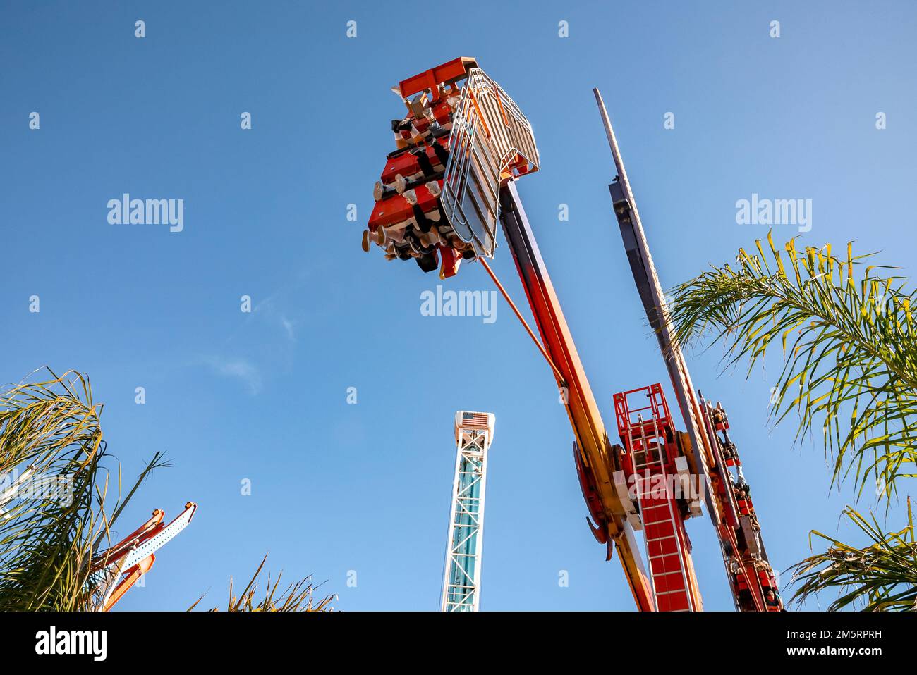 Low angle view of people enjoying typhoon ride at Santa Cruz Beach ...