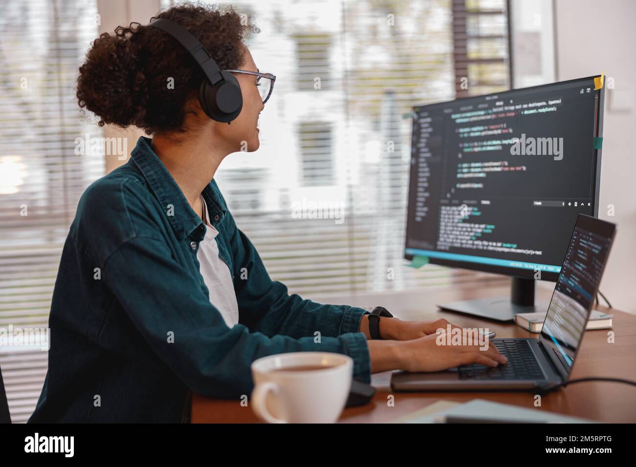 Freelancer female making new project as web designer and programmer on ...