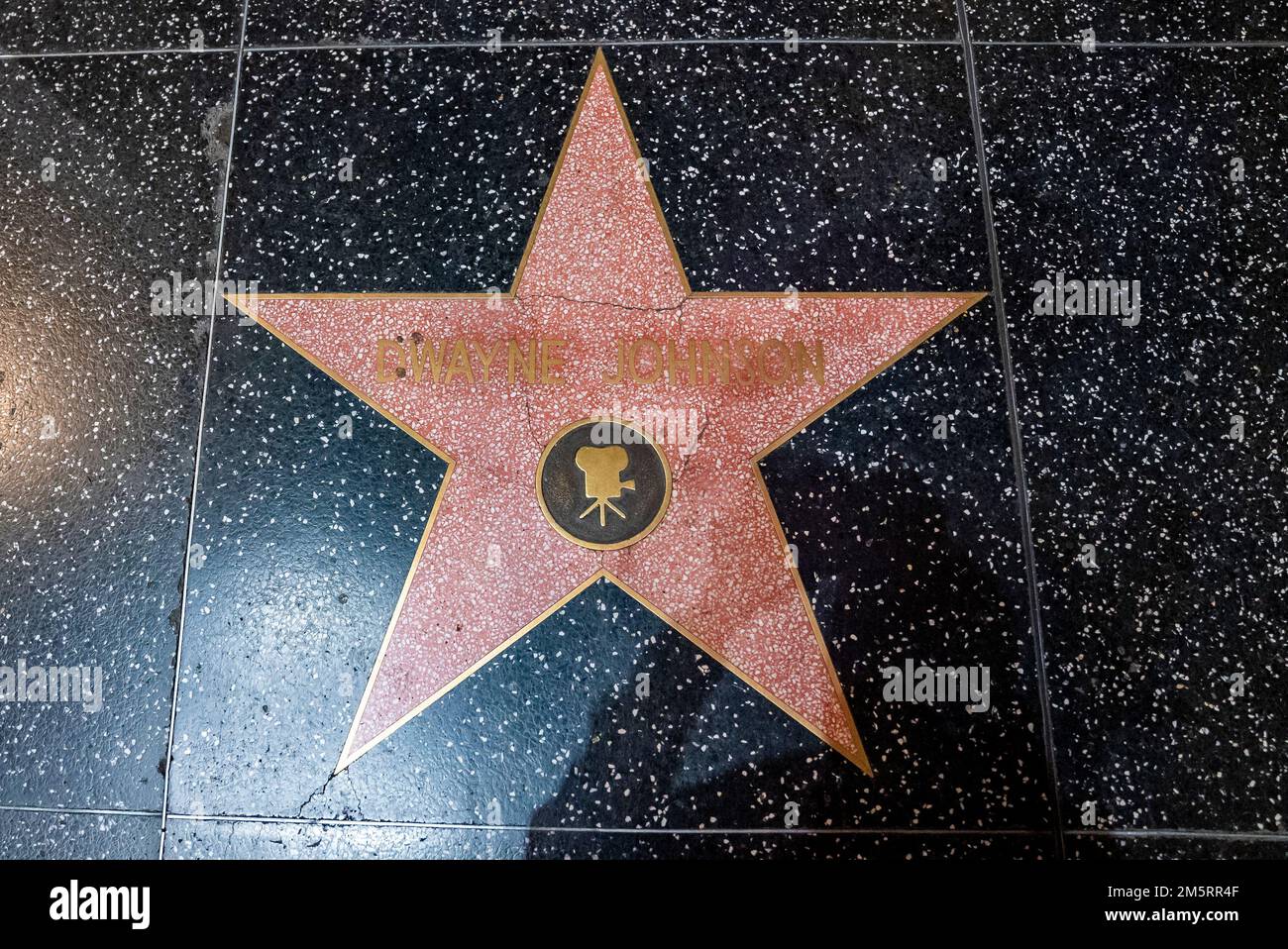 High angle view of Dwayne Johnson text in walk of fame star on sidewalk ...