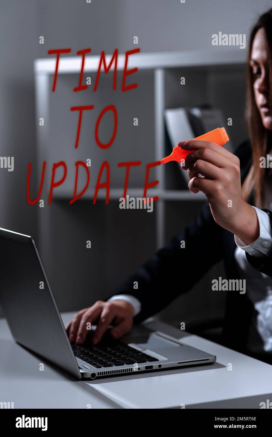 Hand writing sign Time To Update. Internet Concept The latest ...