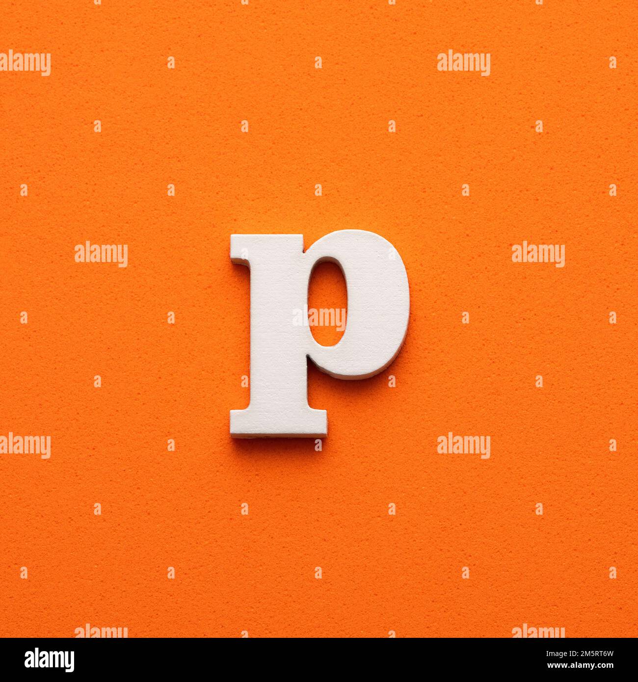 White lowercase letter p on orange foamy background Stock Photo - Alamy