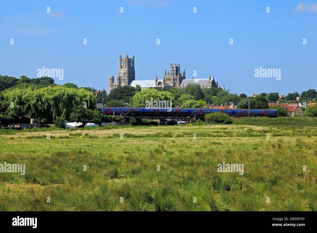 Ely Cathedral, railway train, river, fenland Stock Photo - Alamy