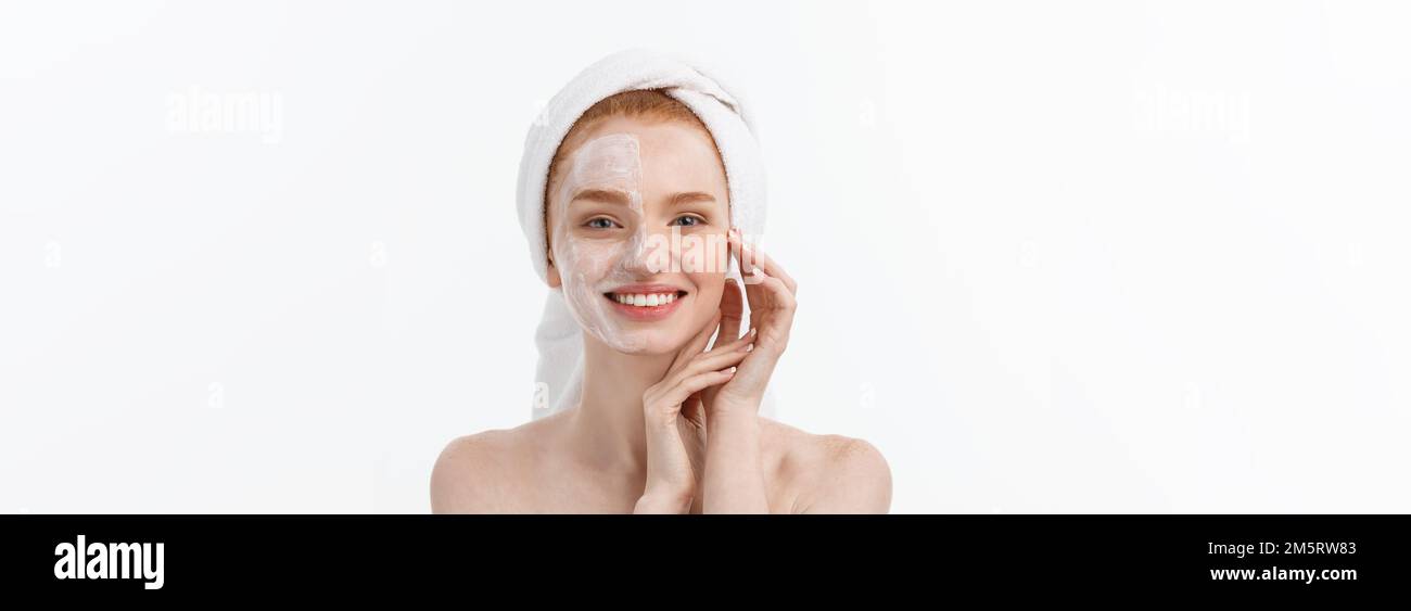 beautiful model applying cosmetic cream treatment on her face on white Stock Photo - Alamy