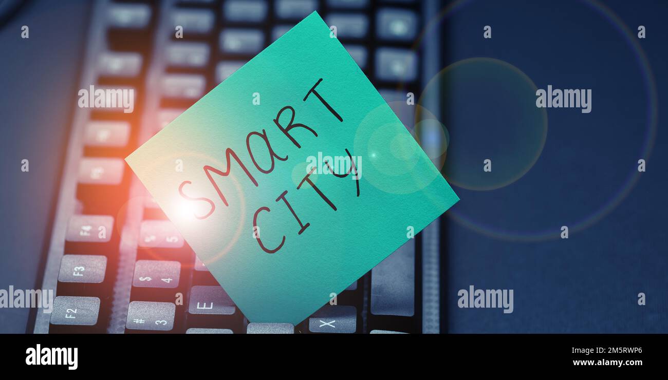 Hand writing sign Smart City, Business overview urban area that uses ...