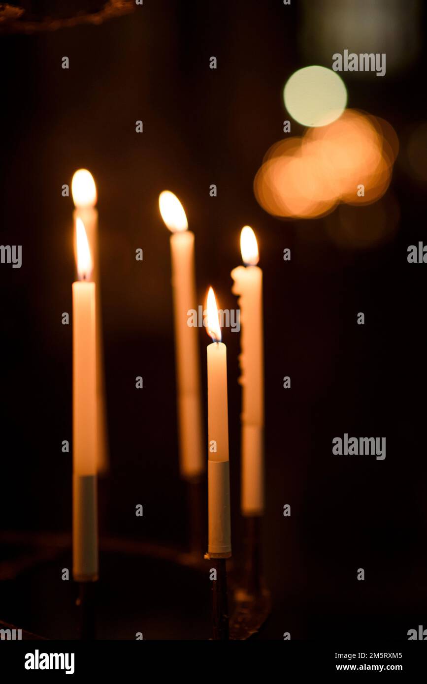 Several candles lit on hi-res stock photography and images - Alamy