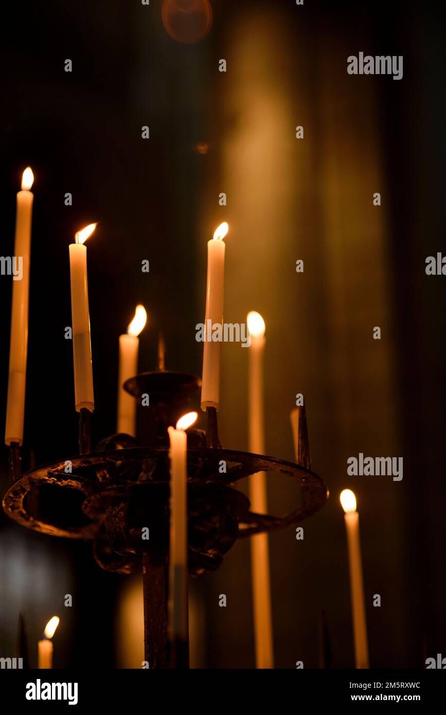 Many wax candles lit hi-res stock photography and images - Alamy